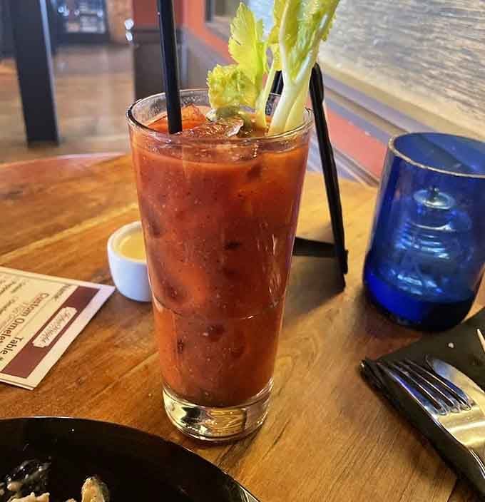 A Bloody Mary garnished with enough celery to count as a salad, making brunch decisions easier everywhere.
