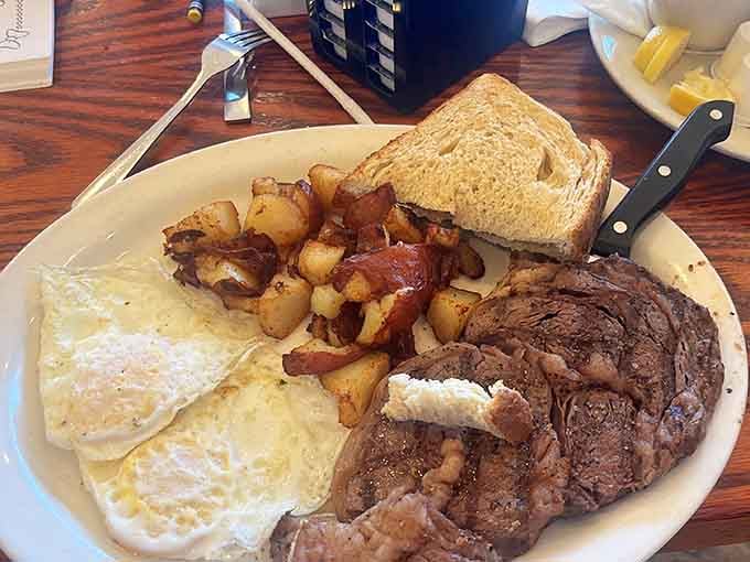 A ribeye that size next to eggs and home fries means someone's not messing around with this whole breakfast thing.