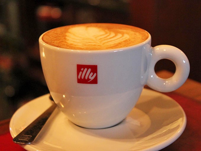 Latte art so pretty you'll hesitate before drinking it, then remember coffee tastes better than Instagram likes.