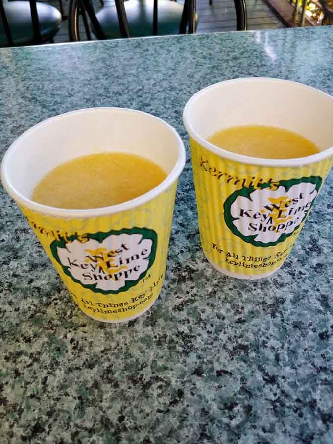 Key lime mimosas in branded cups because apparently someone decided brunch needed more citrus and more genius.