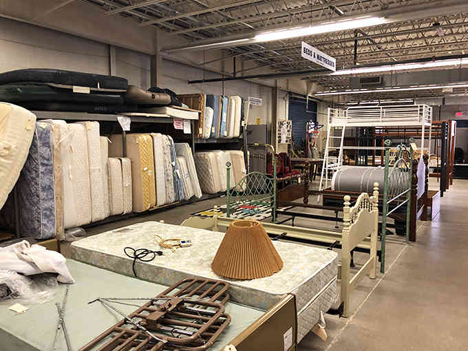 Mattresses and bed frames stand ready to outfit guest rooms, college apartments, or anyone starting fresh on a budget.