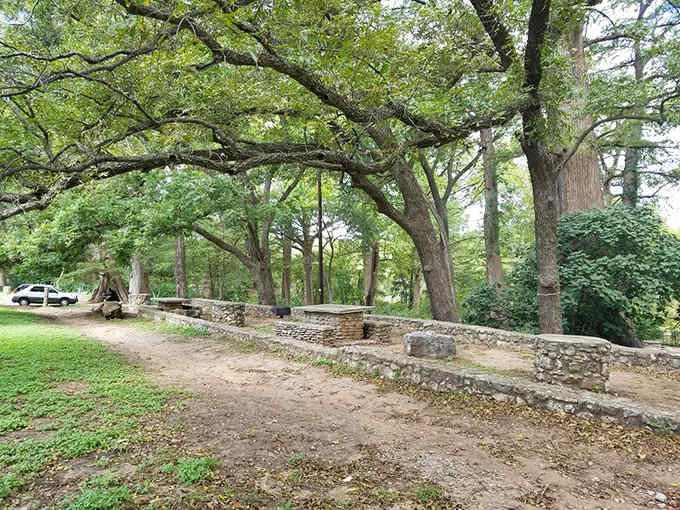 Stone picnic tables under oak shade make every sandwich taste gourmet, or at least significantly better than usual somehow.