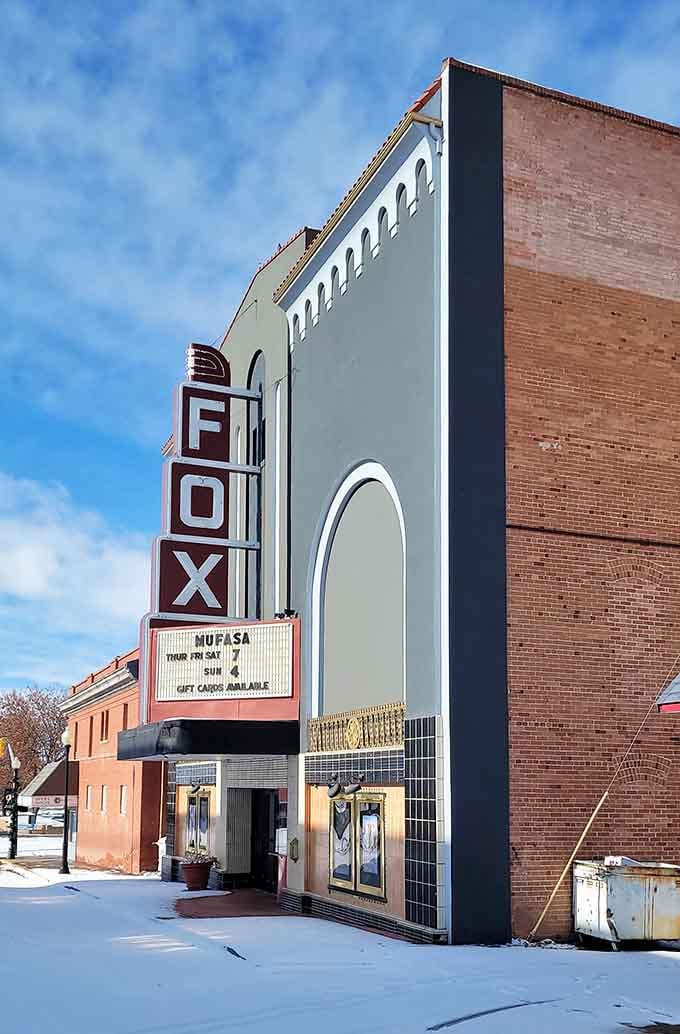 The Fox Theatre's vintage marquee signals entertainment options that don't require streaming subscriptions or WiFi passwords.