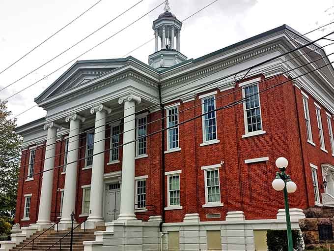 Those grand columns and red brick speak to a time when civic buildings were designed to inspire, not just function.