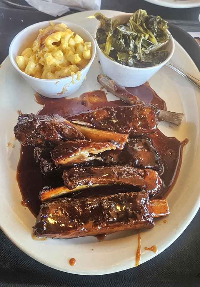 Ribs, mac and cheese, and cabbage create the holy trinity of Southern comfort on one glorious plate.
