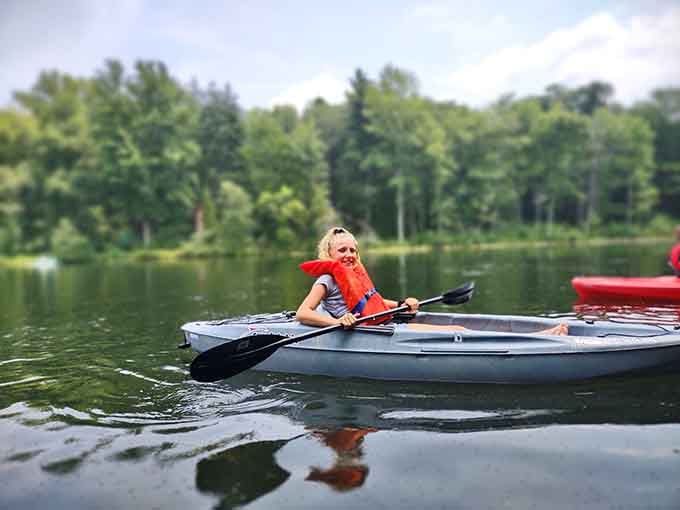 Nothing says "I've got this adulting thing figured out" quite like peacefully paddling across glassy water surrounded by trees.