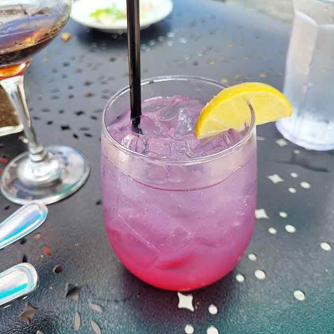 This vibrant cocktail is basically summer in a glass, complete with a lemon slice that means serious business.