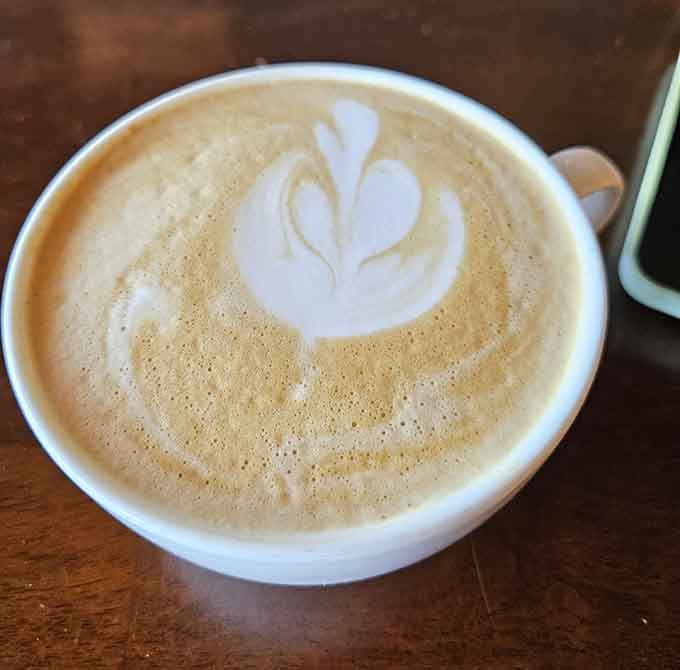 Latte art that's almost too pretty to drink, though let's be honest, you're definitely going to drink it anyway.
