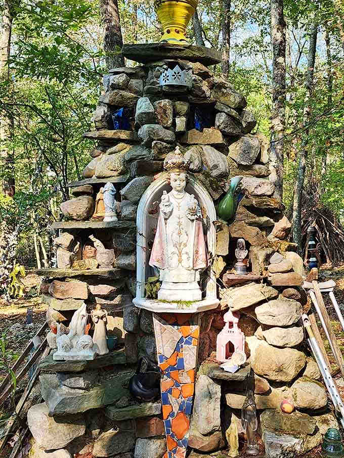 This stone shrine proves that spirituality and whimsy can coexist beautifully among the Sussex County trees.