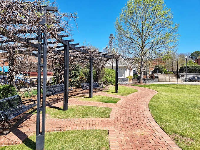 Town Park benches offer front-row seats to the best show around: neighbors actually talking to each other.