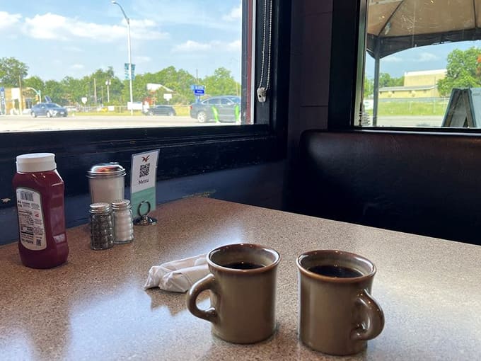 Two mugs of strong coffee waiting patiently by the window, ready to fuel whatever adventure brought you here.