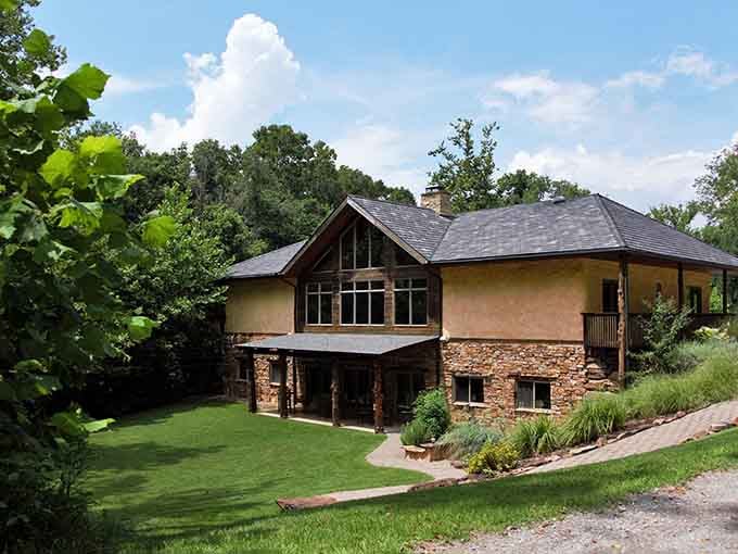 Modern architecture meets forest serenity in this hillside retreat, where the views alone could cure whatever's been bothering you lately.