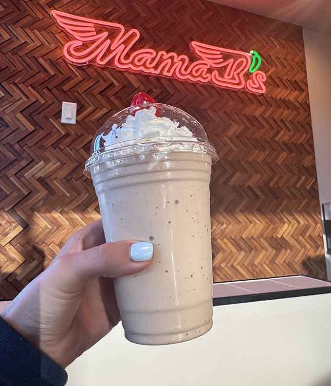 This chocolate shake topped with whipped cream is basically a hug in a cup for your inner child.