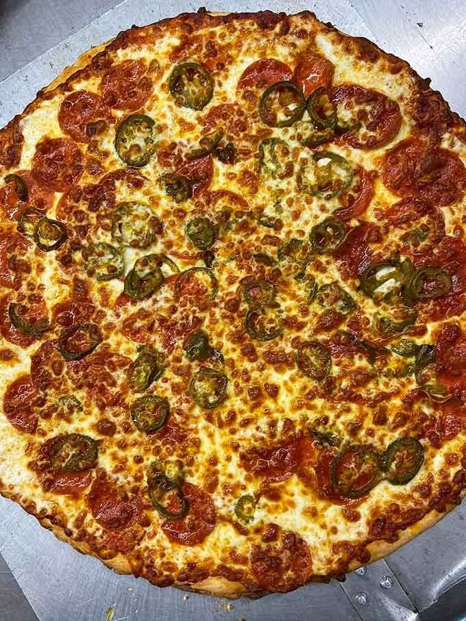 Half pepperoni, half jalape&ntilde;o proves that even Southern buffet spots know their way around a seriously loaded pizza pie.