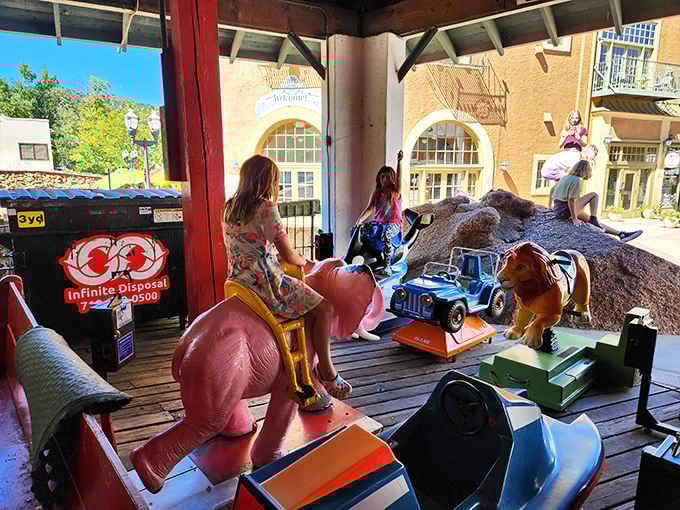 Coin-operated animal rides waiting patiently outside, ready to bounce the next generation of delighted kids around.