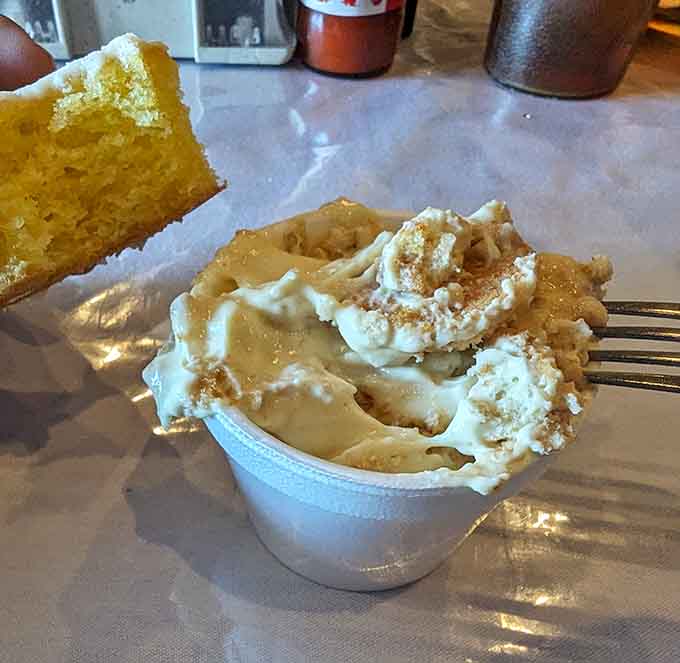 Banana pudding topped with whipped cream and crumbles &ndash; dessert never looked so dangerously tempting.