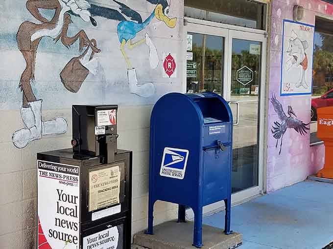 Even the mailbox gets artistic treatment here, standing guard beside murals that'd make Wile E. Coyote jealous.