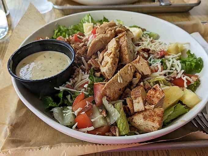 Sometimes a salad can actually be exciting, especially when it's piled this high with grilled chicken and fresh ingredients.