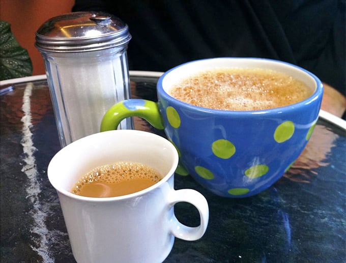 Coffee served in cheerful mugs because your morning caffeine deserves a side of personality and good vibes.