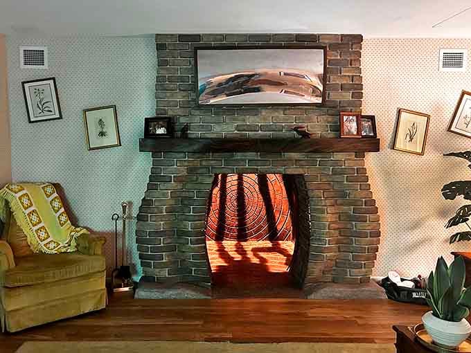 A cozy suburban fireplace that moonlights as an interdimensional portal, because why should furniture be boring?