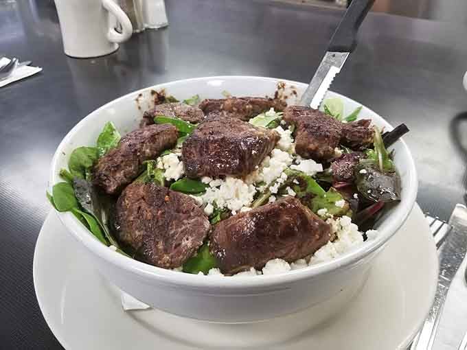Steak tips over fresh greens with feta proves that salads can be substantial enough to satisfy any appetite.