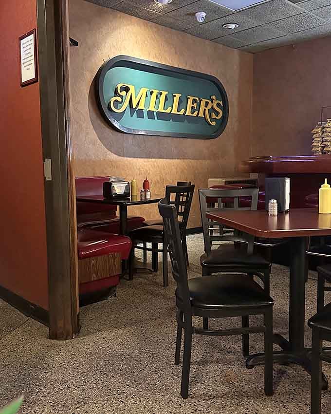 Miller's Bar's dining area where wood paneling and comfortable seating have welcomed generations of hungry burger enthusiasts.