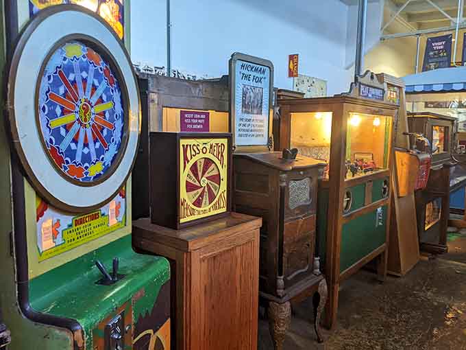 Rows of vintage amusement machines stand ready, each one a portal to simpler times and quarter-fueled happiness.