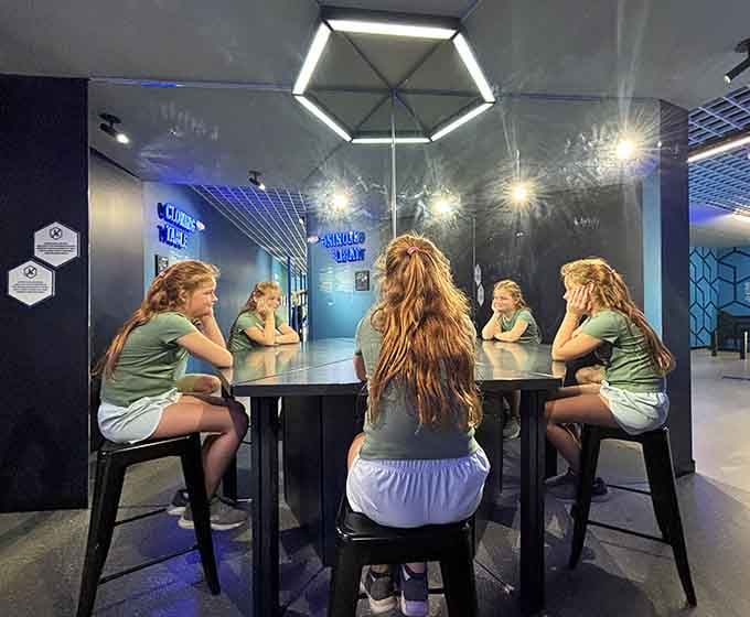 One person sits at this mirrored table, but suddenly there's a whole committee, perfect for faking productivity at meetings.