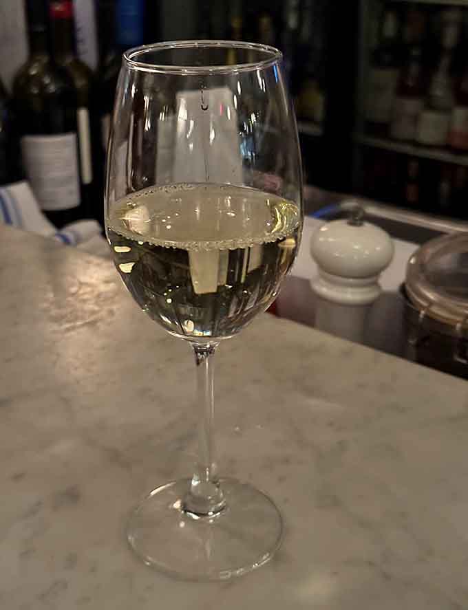 A crisp white wine standing ready to complement whatever briny delights are heading your way next.