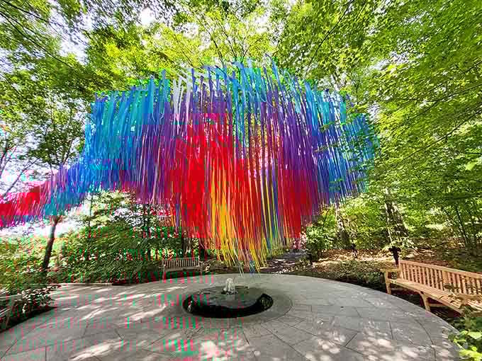 This rainbow installation transforms the garden into an outdoor art gallery where nature meets human creativity in spectacular fashion.