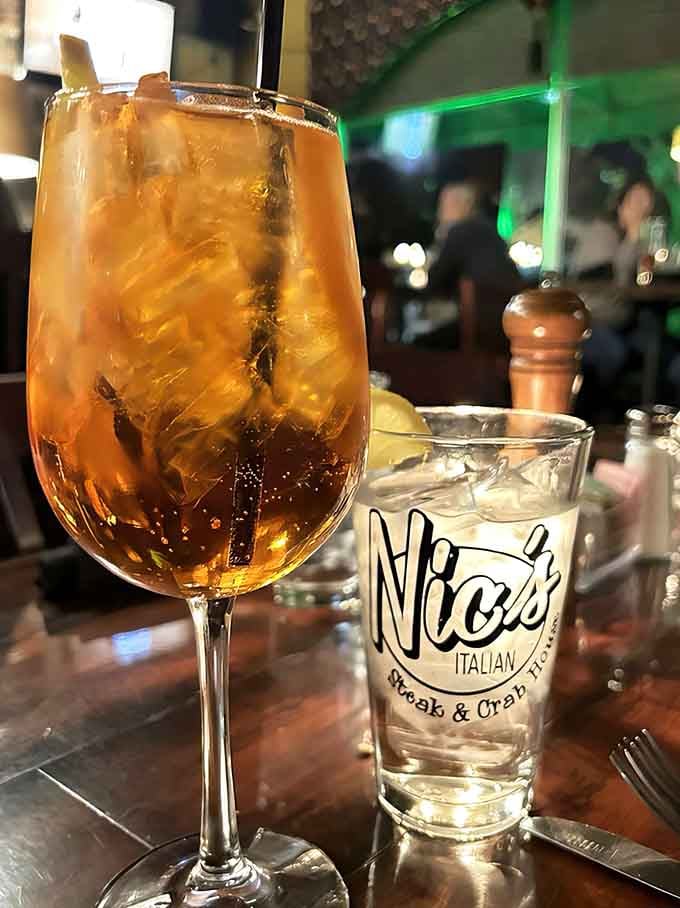 An Aperol Spritz that looks like liquid sunshine decided to take a vacation in your glass.