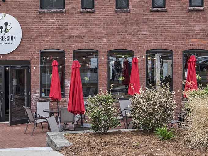 Outdoor dining spaces where the ambiance comes from good company rather than a designer's vision of industrial chic.