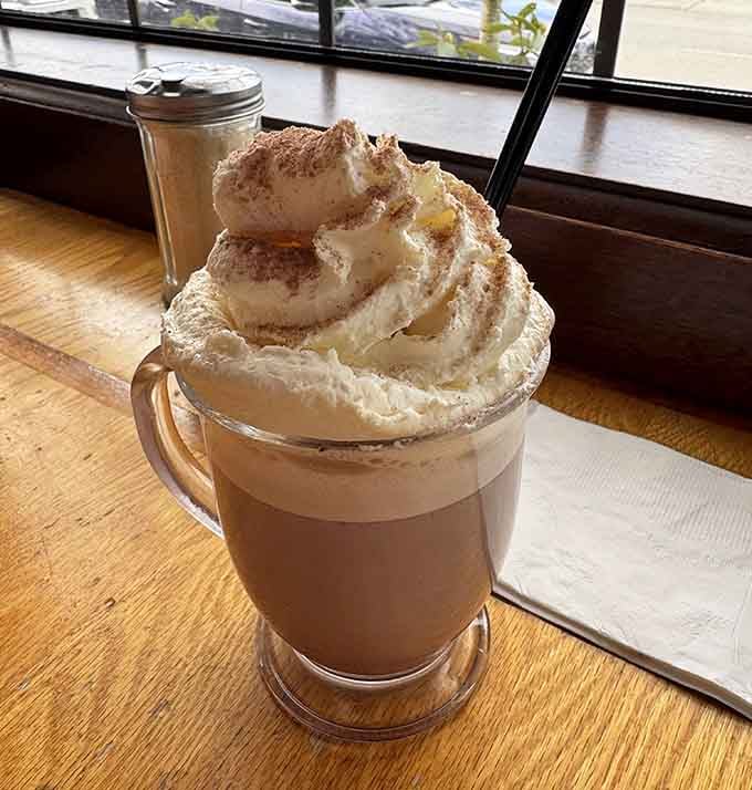This hot chocolate comes topped with enough whipped cream to make your inner child do a happy dance.