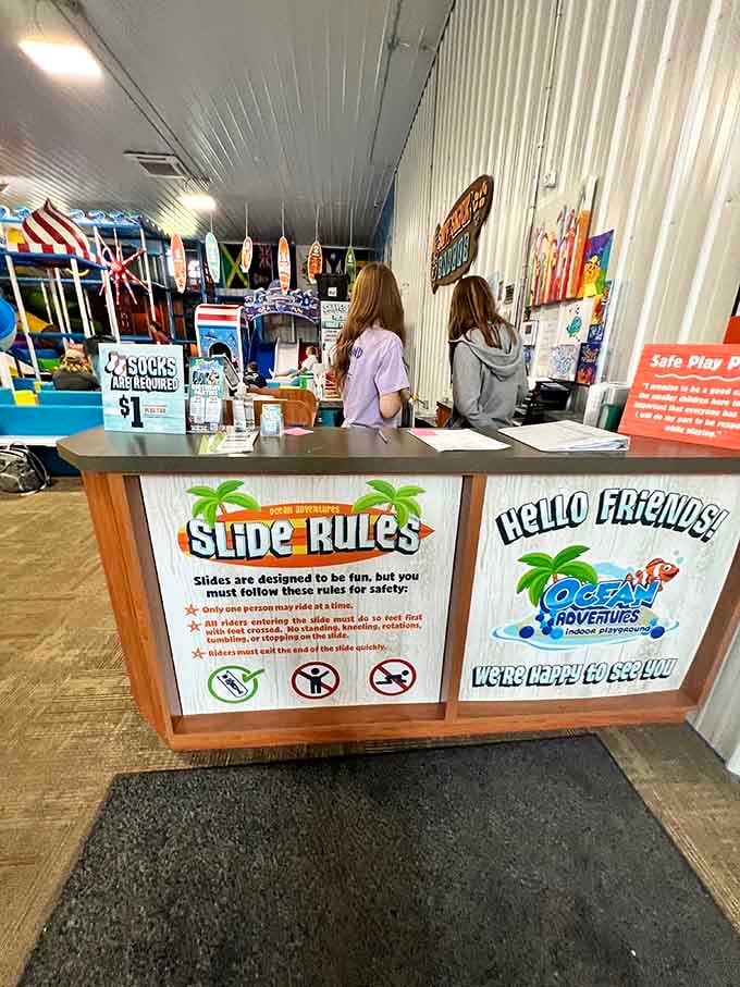 The friendly front desk welcomes families into this aquatic adventure, socks required but enthusiasm completely optional.