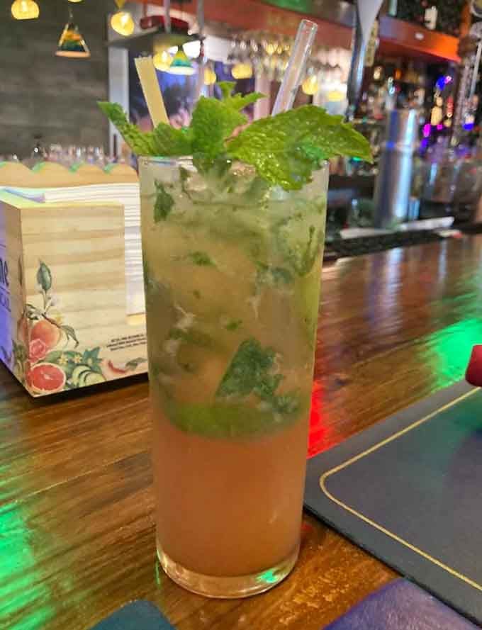 That mojito's got more mint than a government printing press, and we're not complaining about this kind of abundance.