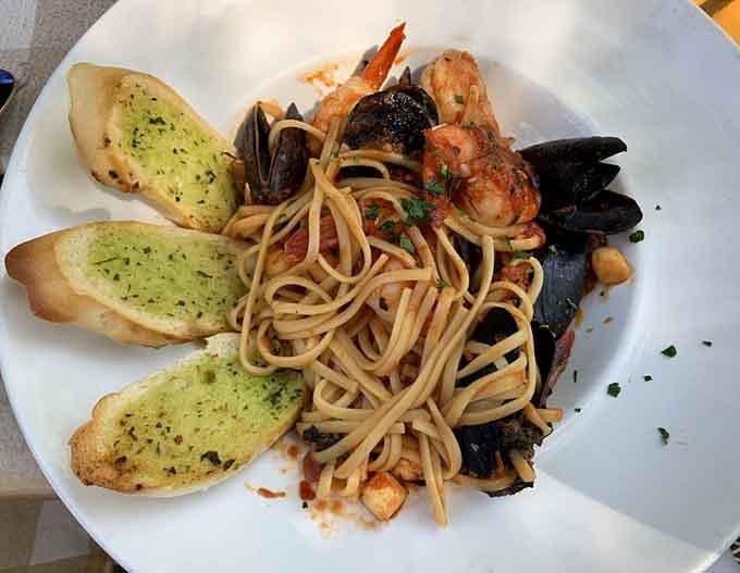 Seafood pasta loaded with treasures from the sea, proving that sometimes more is definitely more when done right.