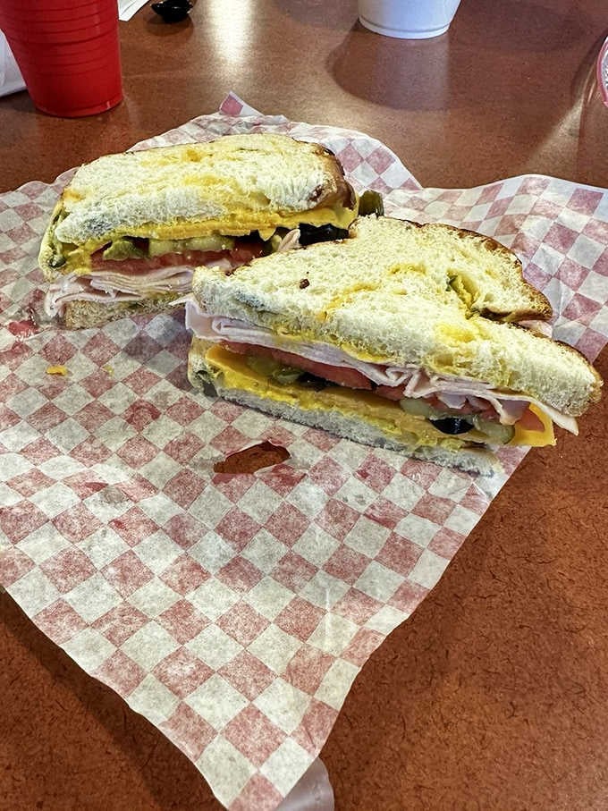 Turkey and cheese nestle between soft bread, proving sometimes the classics need no improvement or fancy additions.