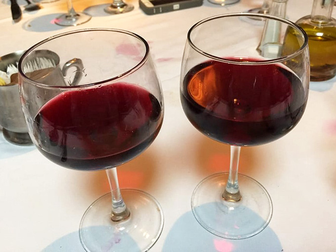 Two glasses of red wine at an Italian restaurant means you're doing something very, very right tonight.