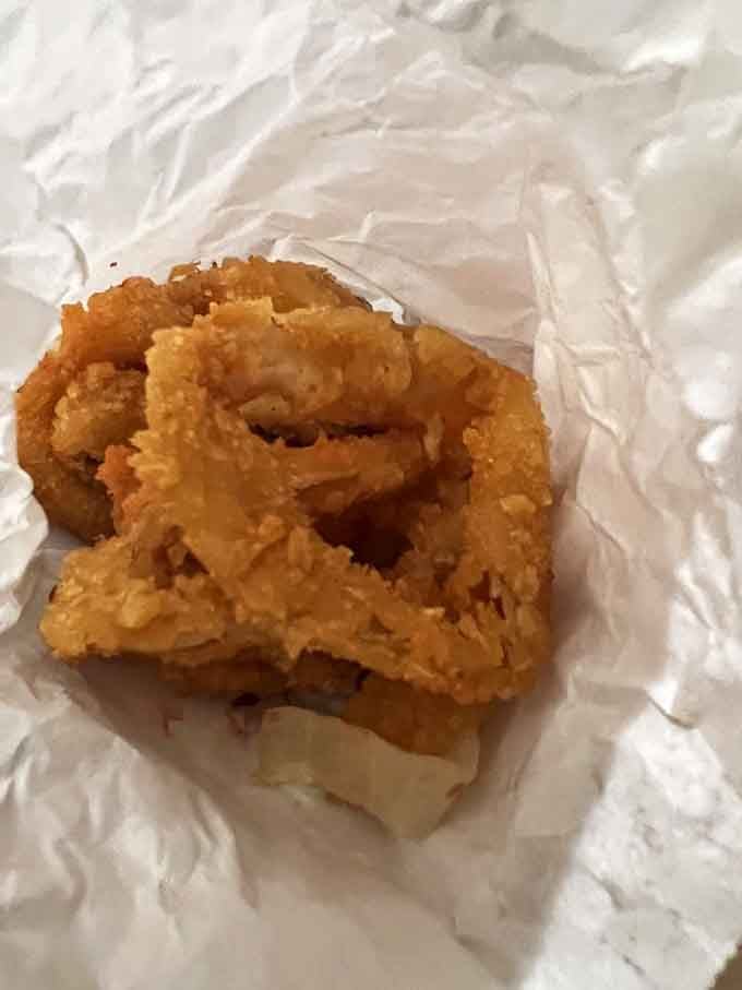 Golden, crispy rings of perfection that prove onions were always meant to be deep-fried and devoured immediately.