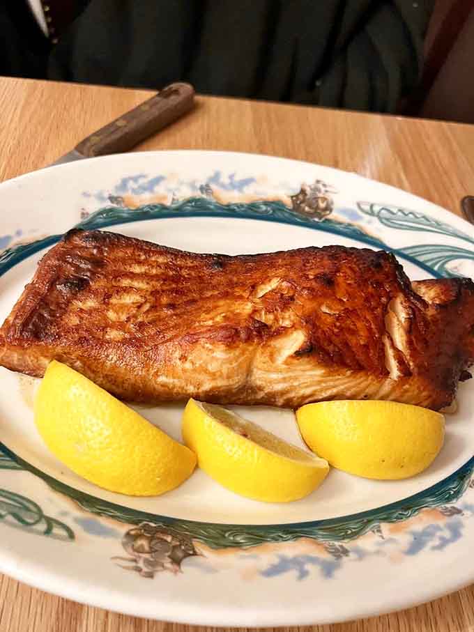 Even the salmon gets the royal treatment here, proving this steakhouse knows its way around all premium proteins.