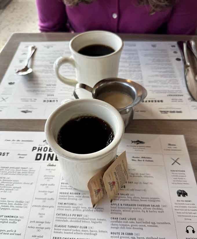 Two cups of proper drip coffee sitting on the menu, ready to jumpstart your morning the right way.