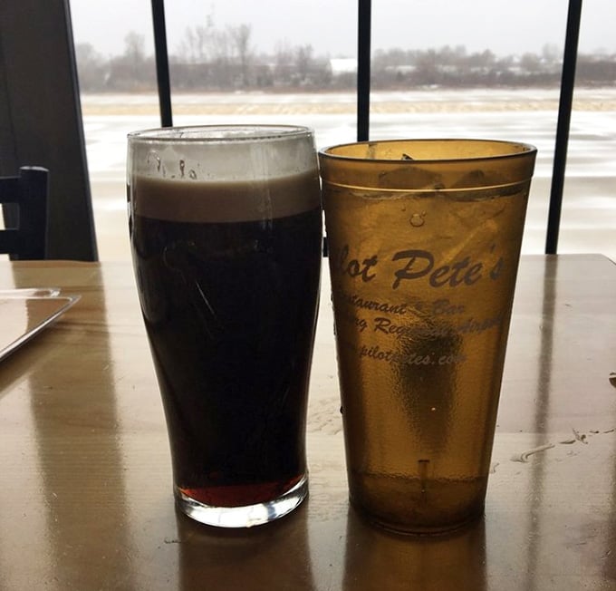Cold beverages with a runway view turn ordinary drinks into front-row seats for the aviation show outside.