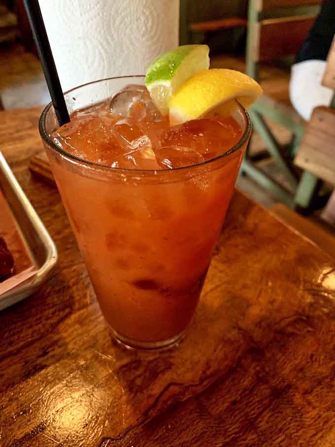 A cold drink with citrus garnish is exactly what you need when facing down a tray of smoked meats.