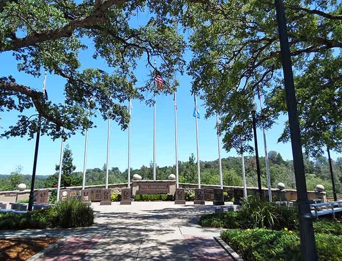 The Veterans Monument stands proud under towering oaks, a peaceful tribute that reminds us some things matter more than affordability.