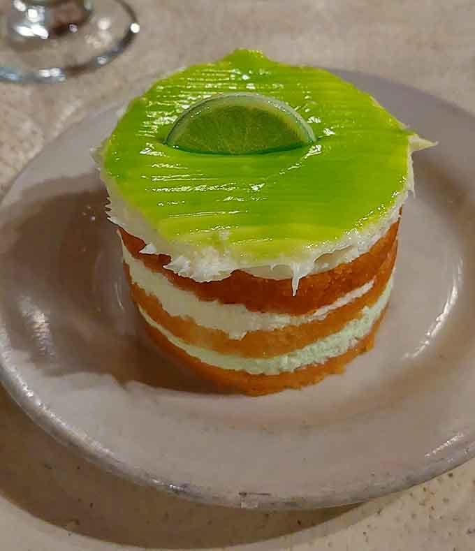 This vibrant key lime creation looks like sunshine on a plate and tastes even better than it photographs.