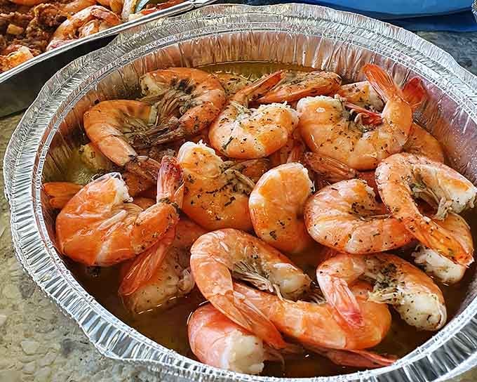 Garlic butter shrimp glistening in that foil pan is basically edible sunshine with a hint of the sea.