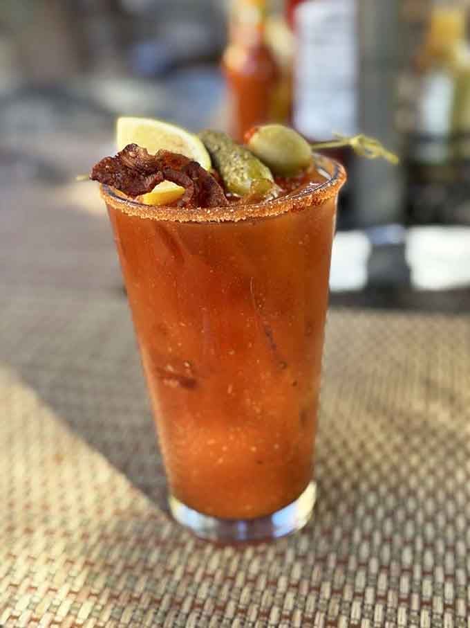 A Bloody Mary garnished like it's auditioning for a role in a food magazine's greatest hits collection.