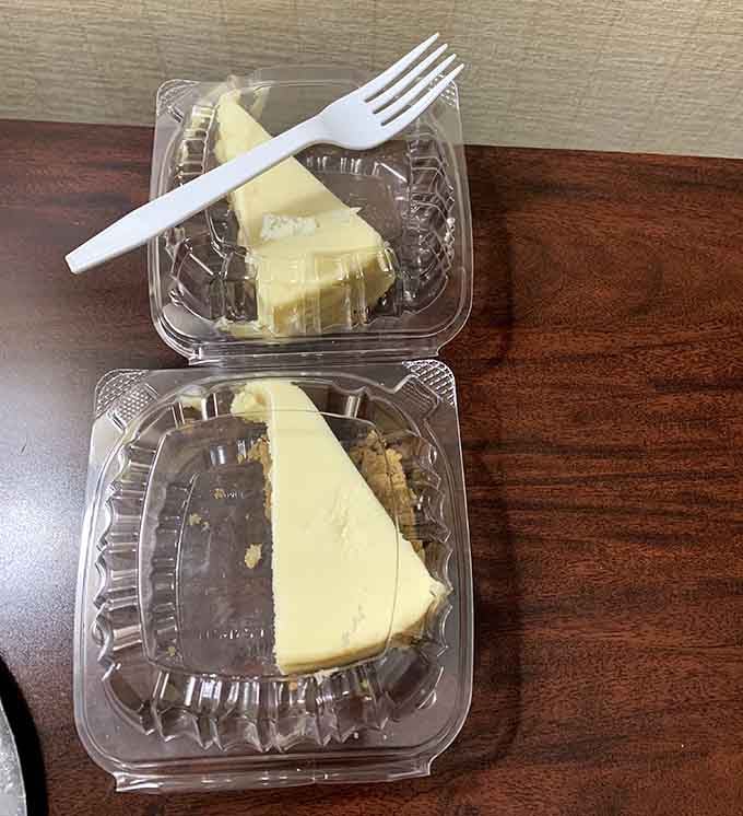 Two slices of cheesecake waiting patiently, because every great meal deserves a sweet ending worth remembering.