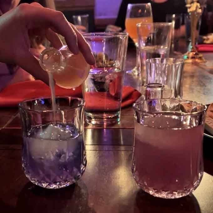 A rainbow of libations that prove the bartenders here take their craft as seriously as their spooky aesthetic.