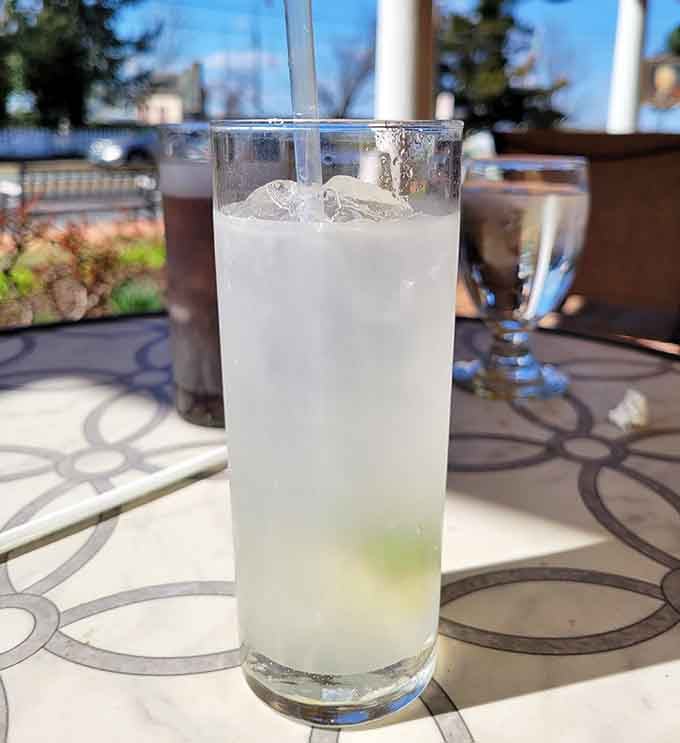 A refreshing cocktail with a view, proving that good drinks taste even better when there's water nearby.